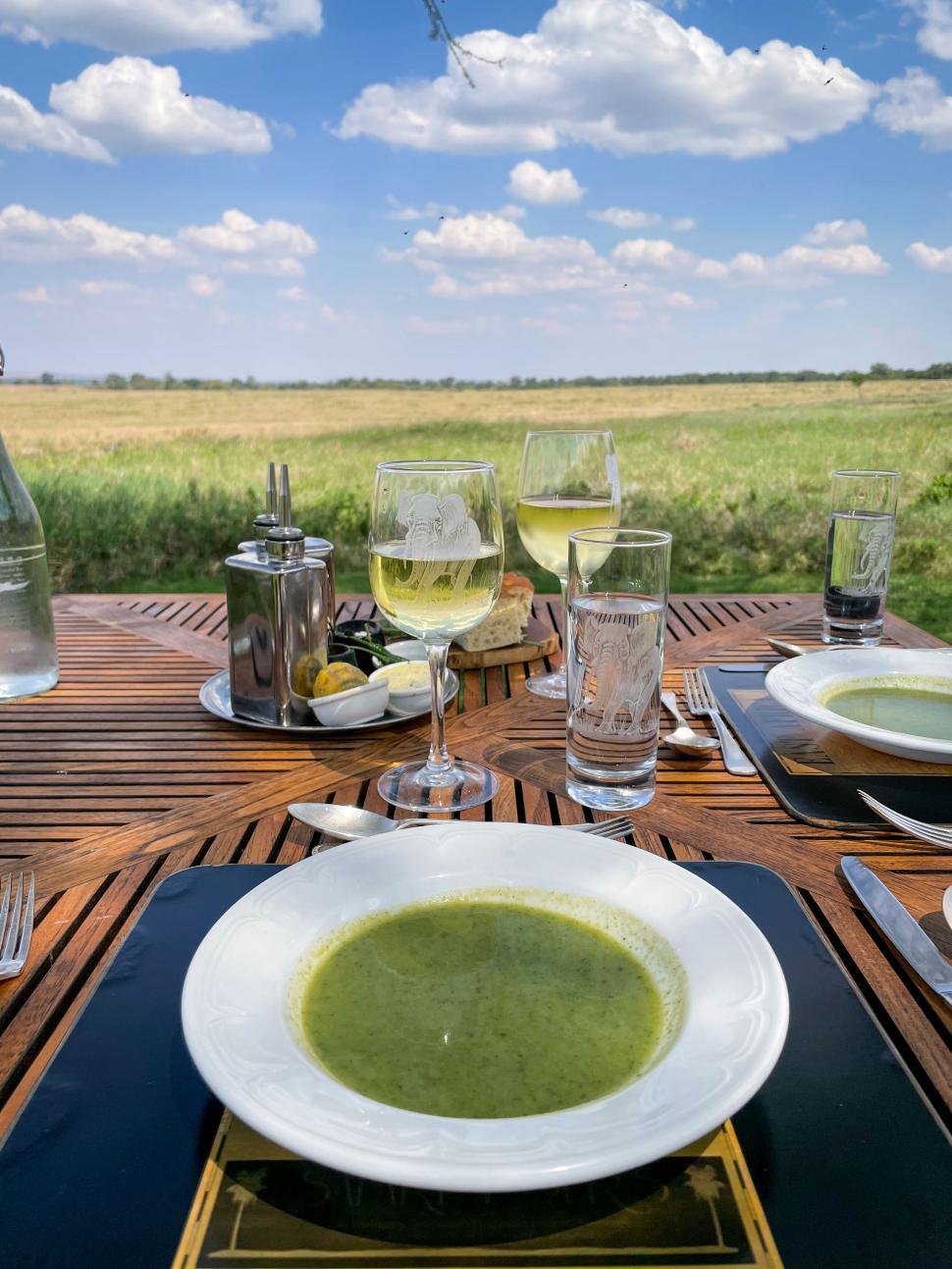 Free Stock Photo of Outdoor dining setup with bowls of green soup ...
