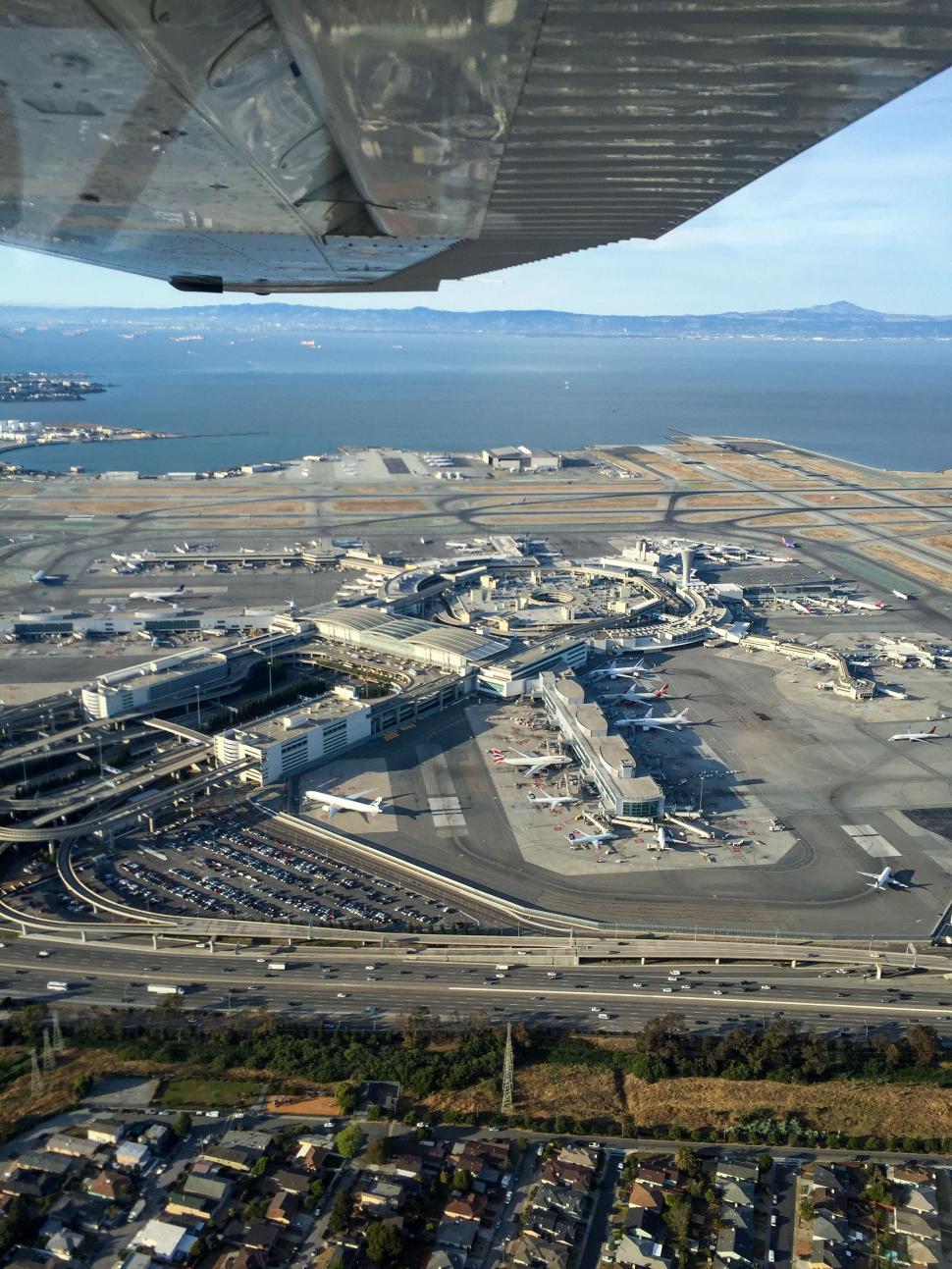 Free Stock Photo of Aerial view of busy airport terminal with several ...