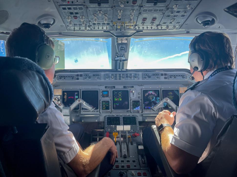Free Stock Photo of Two pilots inside cockpit operating a commercial ...