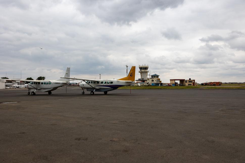 Free Stock Photo of Airport runway with small planes on a cloudy day ...