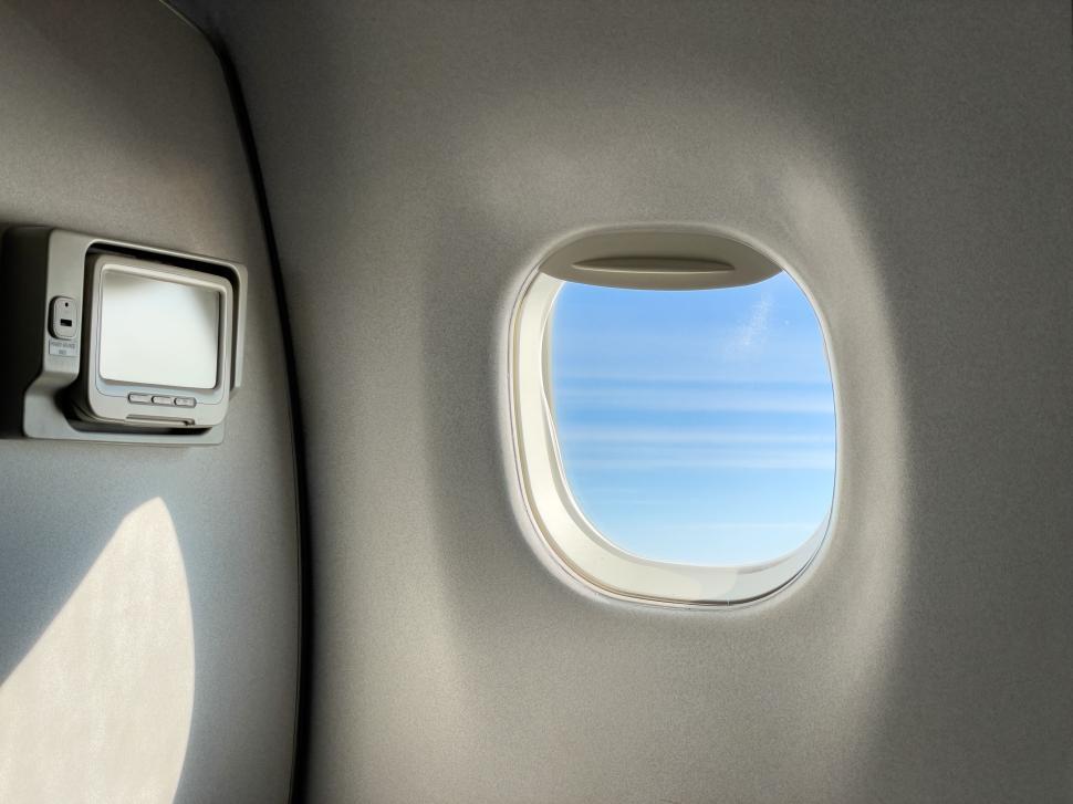 Free Stock Photo of Airplane window view with in-flight entertainment ...