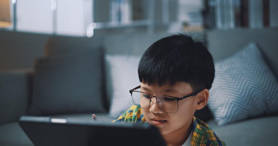 Free Stock Photo of Asian genius boy use tablet doing homework in living room | Download Free ...