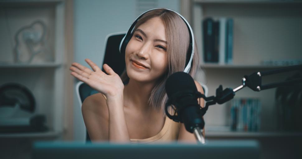 Free Stock Photo of Cheerful Young podcaster use microphone during ...