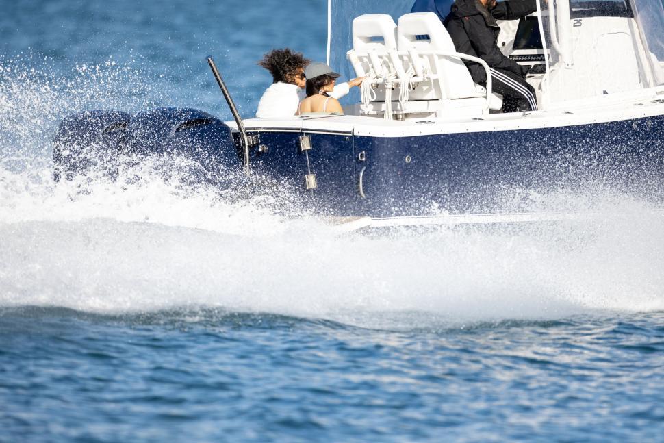 Free Stock Photo of Speedboat cutting through blue ocean waters, people ...