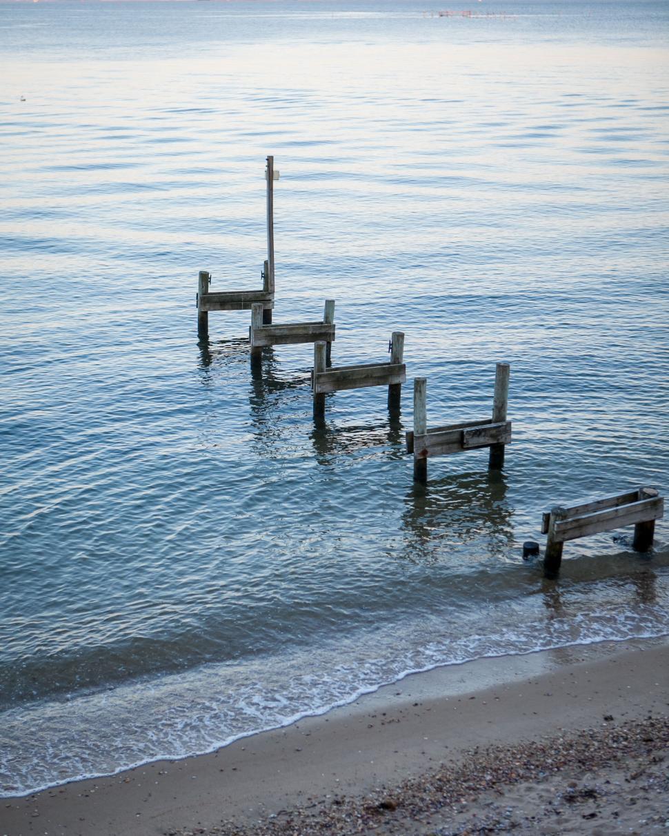 Free Stock Photo of Seaside dock remnants extending into calm waters ...
