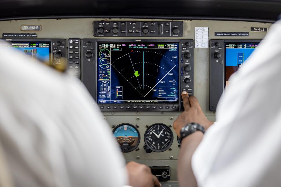Free Stock Photo of Pilots in cockpit navigating with modern flight ...