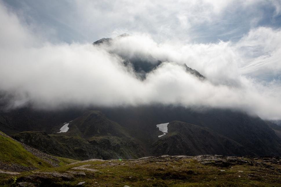 Free Stock Photo of Cloudy mountain with mist surrounding the peak ...