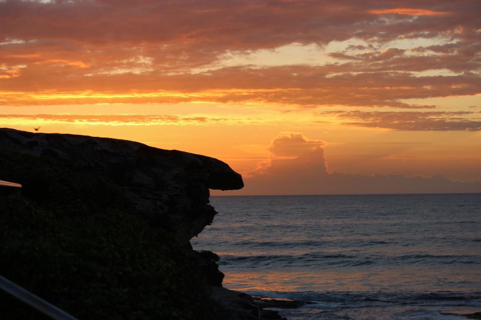 Free Stock Photo of Sunset view with cliff silhouette and calm ocean ...