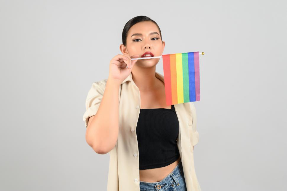 Free Stock Photo of Pretty woman celebrates LGBTQ pride with rainbow ...