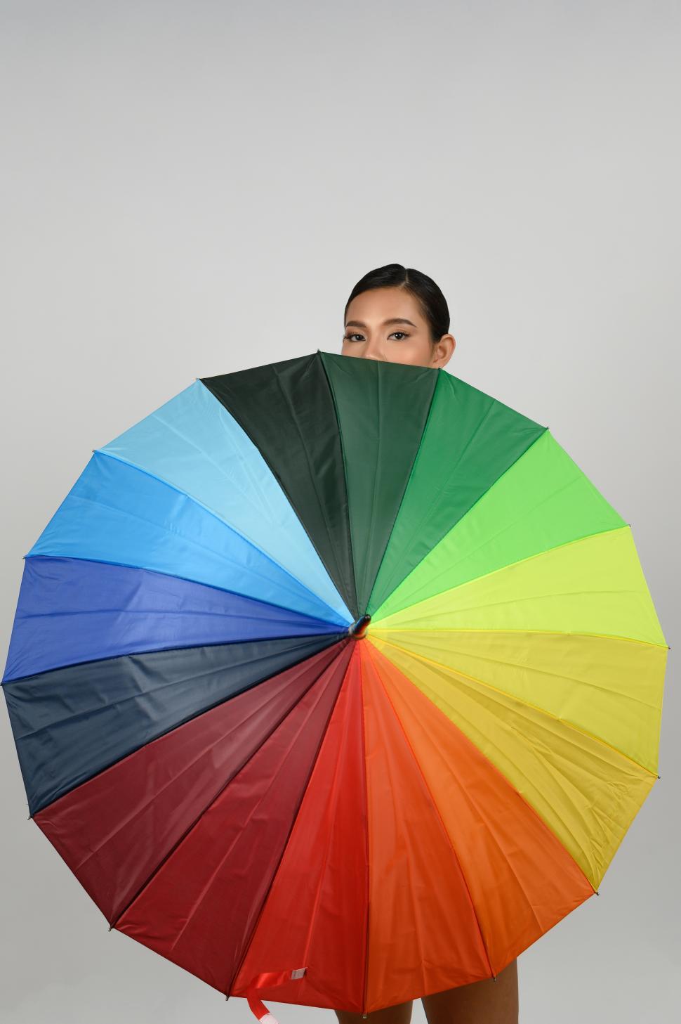 Free Stock Photo of Woman celebrating diversity with a rainbow umbrella ...