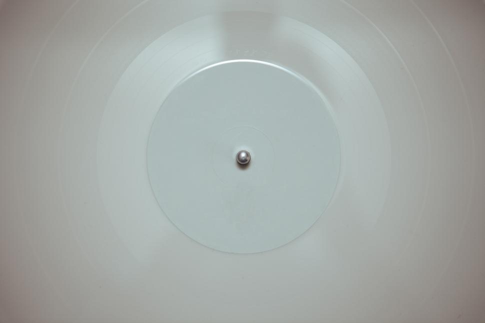 Free Stock Photo of Vinyl record spinning on turntable with metallic ...