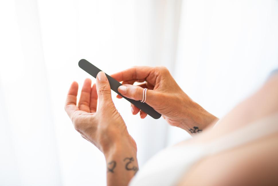Free Stock Photo of Woman filing her nails | Download Free Images and ...
