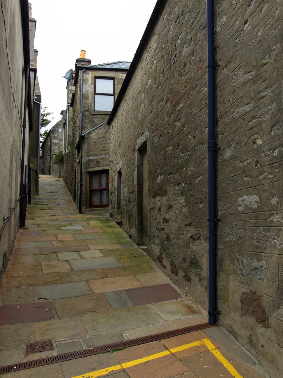 Free Stock Photo of Narrow stone alleyway in a quiet residential area ...