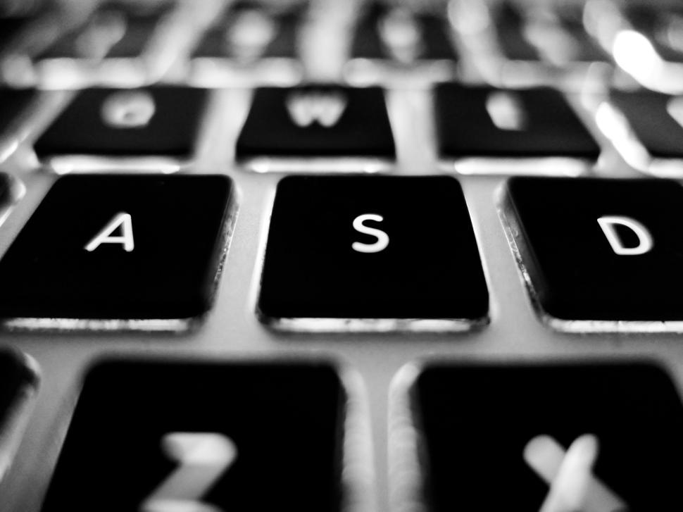 Free Stock Photo of Close-up view of black keyboard keys highlighting ...