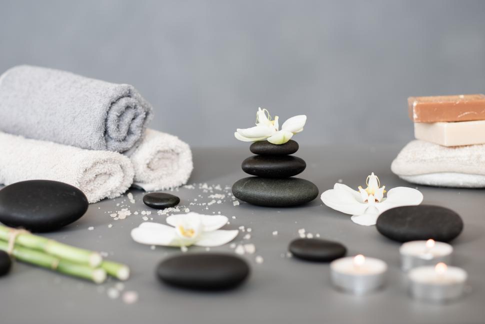 Free Stock Photo of Relaxing spa setup with stones and flowers for ...