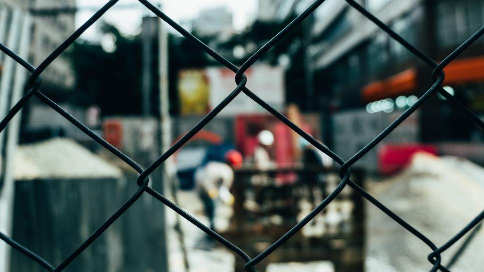 Free Stock Photo of Construction site through chain link fence ...