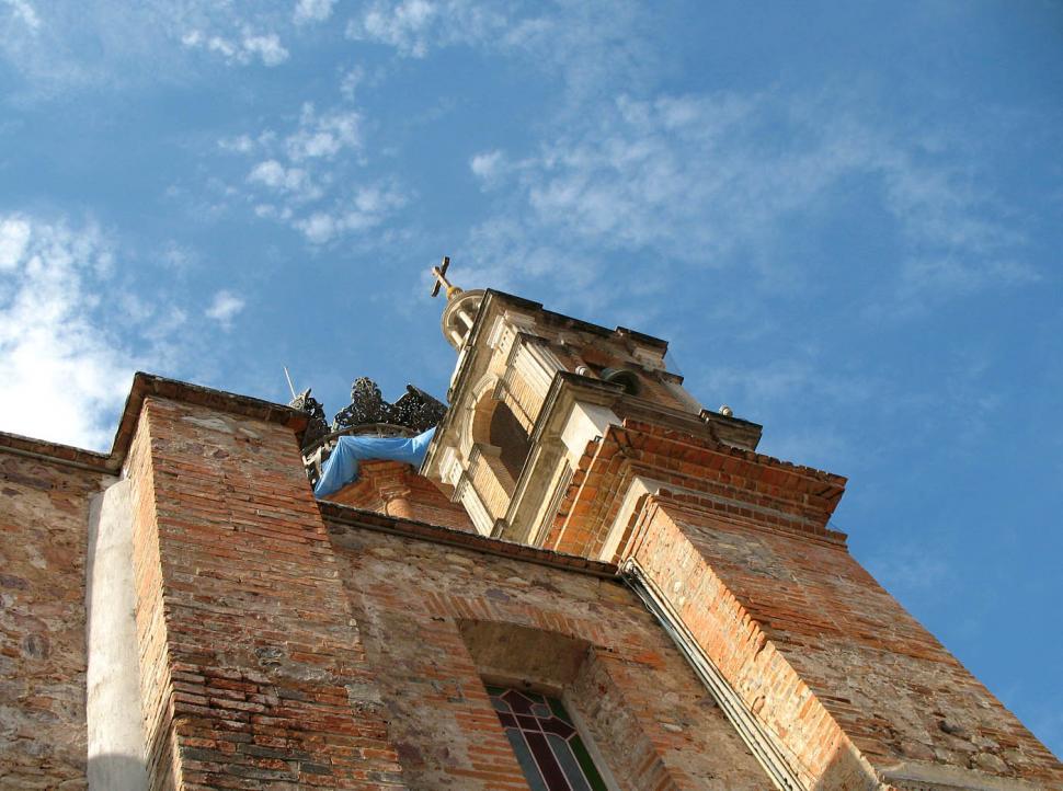 Free Stock Photo of Tall Brick Building With Statue on Top | Download ...