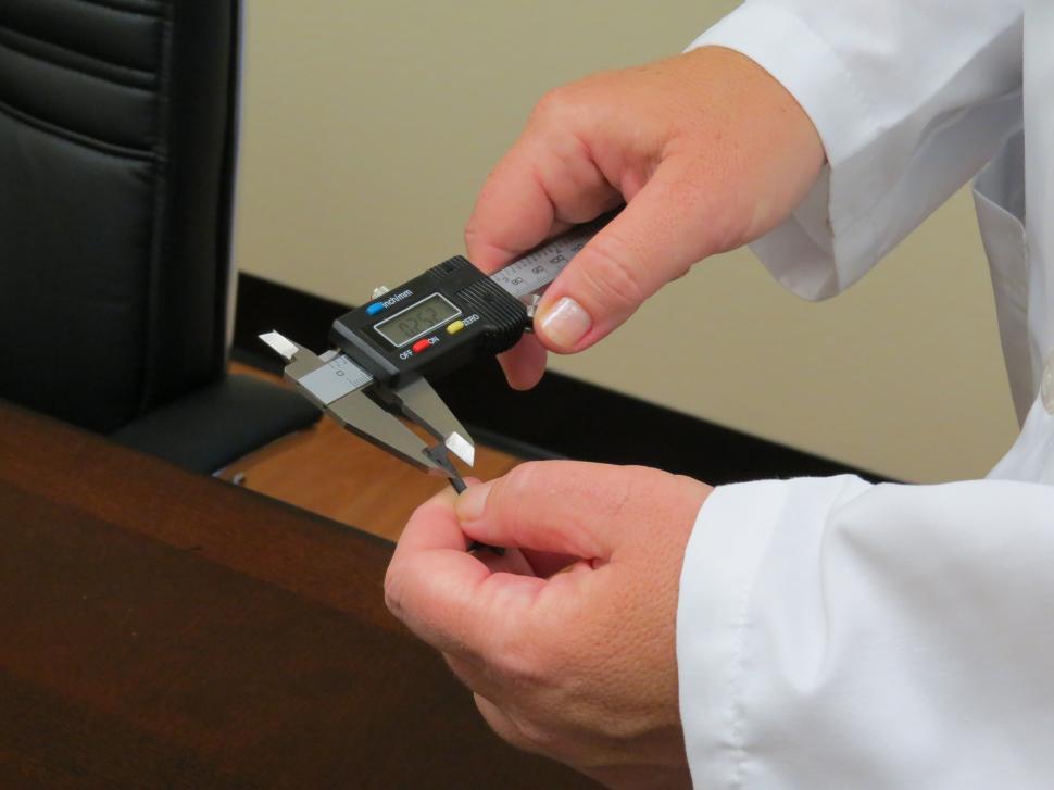 Free Stock Photo of Caliper measuring a plastic part | Download Free ...