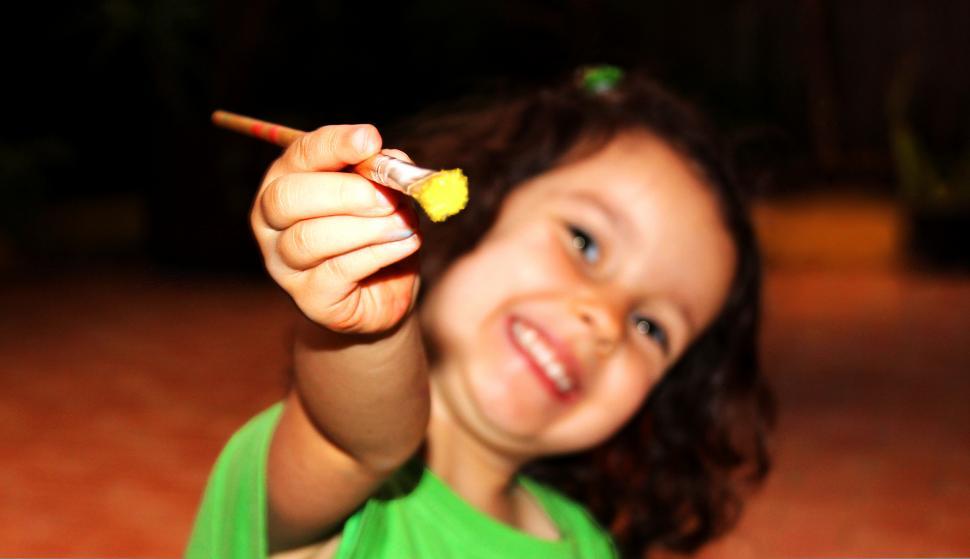 Free Stock Photo of Child holding and pointing forward a paintbrush ...