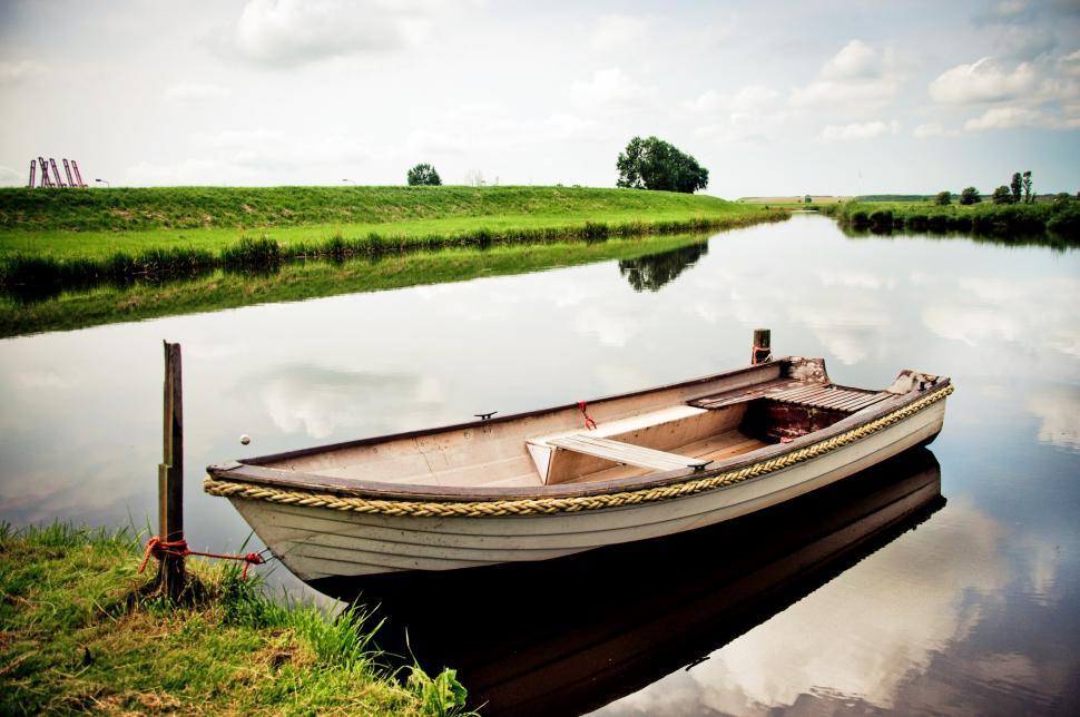 Free Stock Photo of Small Boat Floating on Body of Water | Download ...