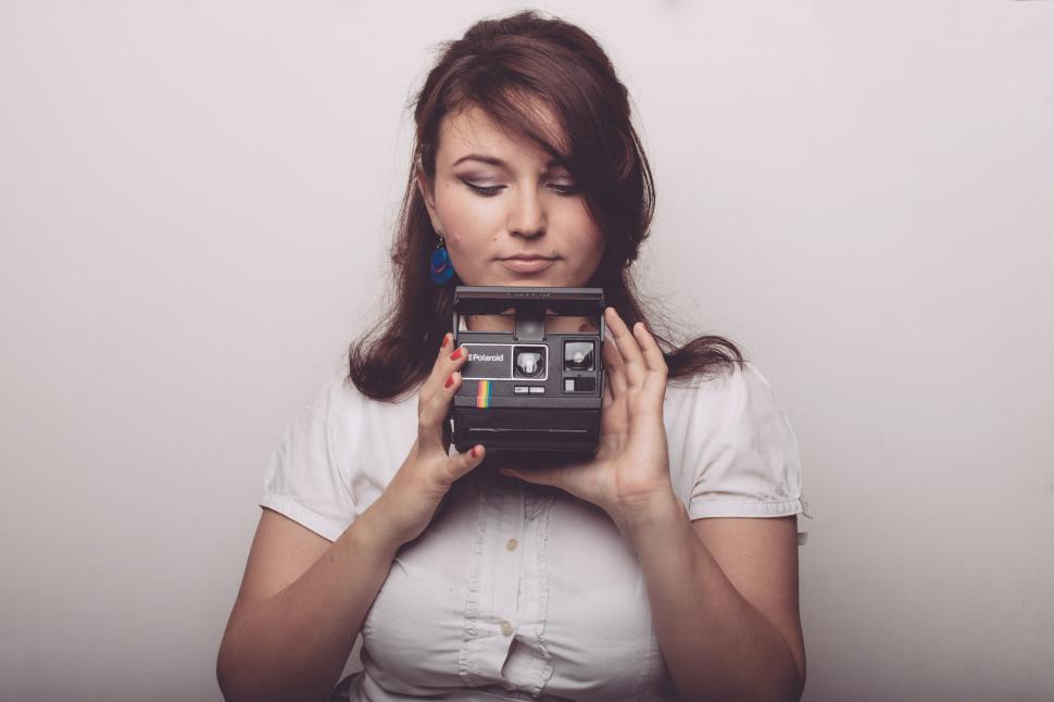 Free Stock Photo of Woman Holds Camera in Front of Face | Download Free ...