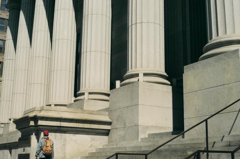 Free Stock Photo of Person Walking Up Steps in Front of Building ...