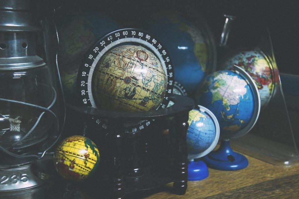 Free Stock Photo of Assorted Globes Displayed on a Shelf | Download ...