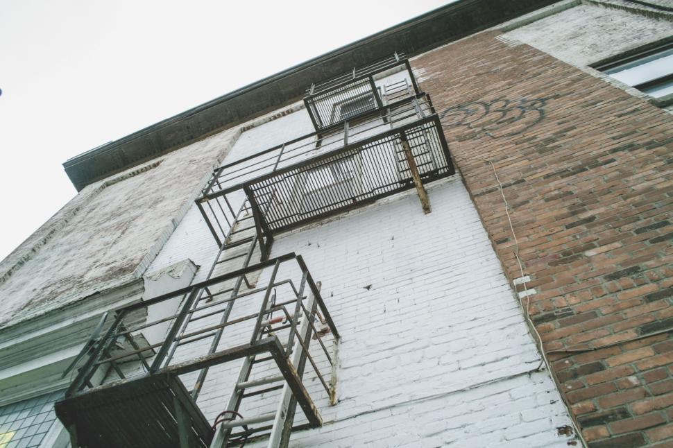Free Stock Photo of Tall Brick Building With Fire Escape | Download ...