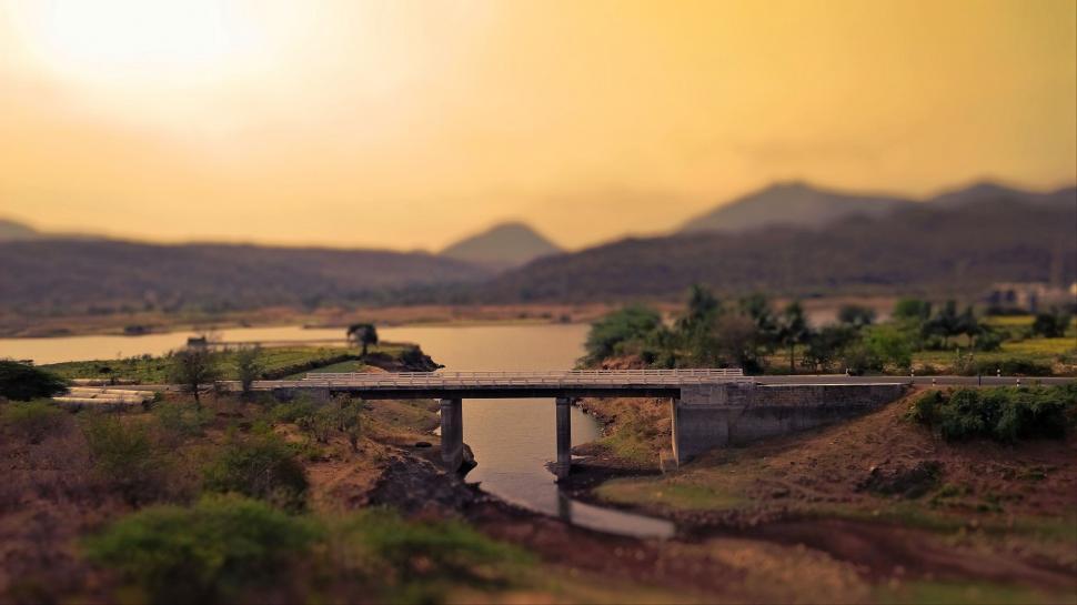 Free Stock Photo of Bridge Crossing River With Mountains in Background ...
