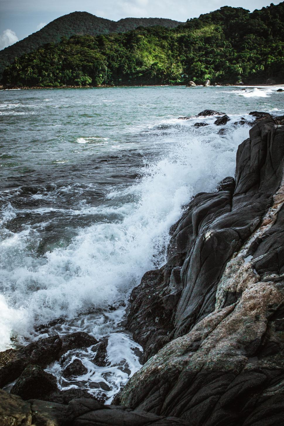 Free Stock Photo of Rocky Shoreline Beside Large Body of Water ...