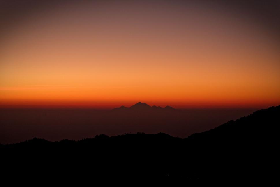Free Stock Photo of Sun Setting Over Mountain Range | Download Free ...