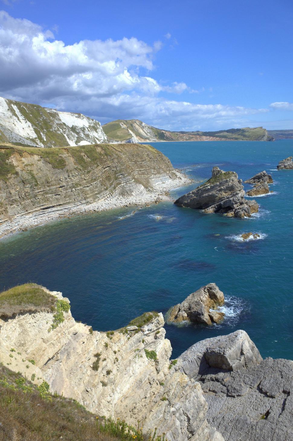 Free Stock Photo of Large Body of Water Surrounded by Rocks | Download ...