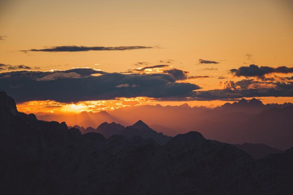 Free Stock Photo of Sun Setting Over Mountain Range | Download Free ...