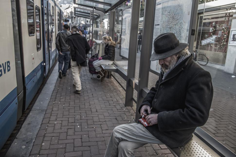 Free Stock Photo of Man Sitting on Bench Next to Train | Download Free ...