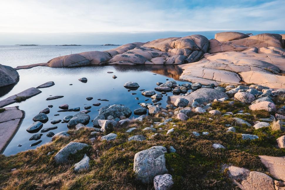 Free Stock Photo of Body of Water Surrounded by Rocks and Grass ...
