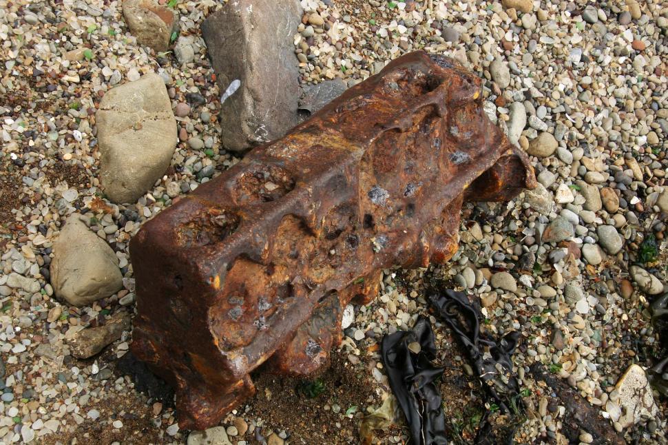 Free Stock Photo of Rusted Metal Piece on Rocky Ground | Download Free ...