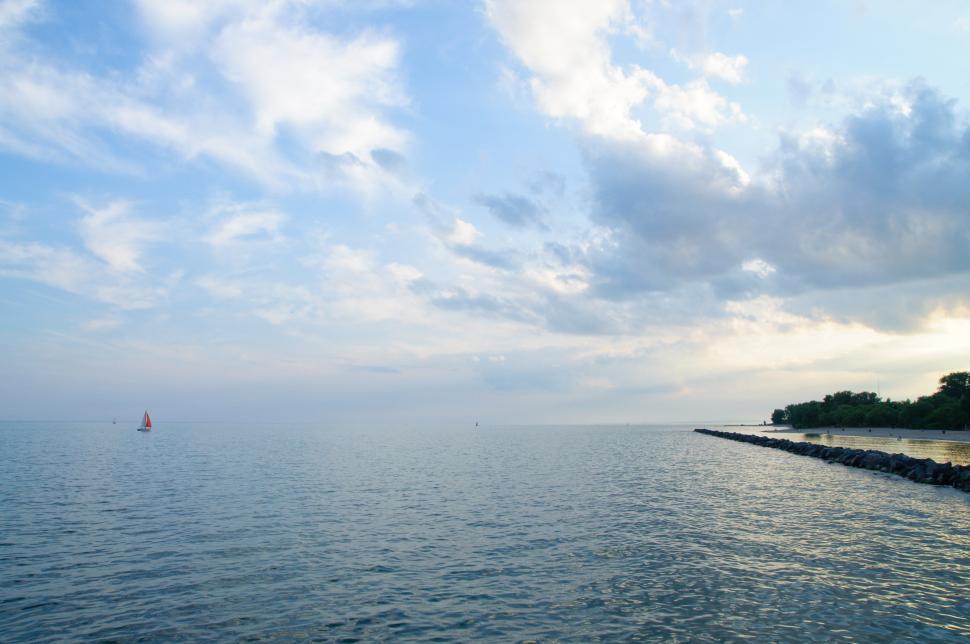 Free Stock Photo of Sailboat Sailing on Distant Body of Water ...