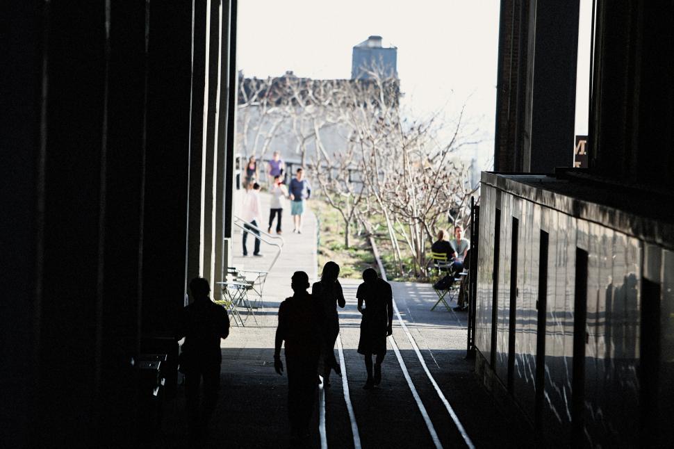 Free Stock Photo of Group of People Walking Down a Hallway | Download ...