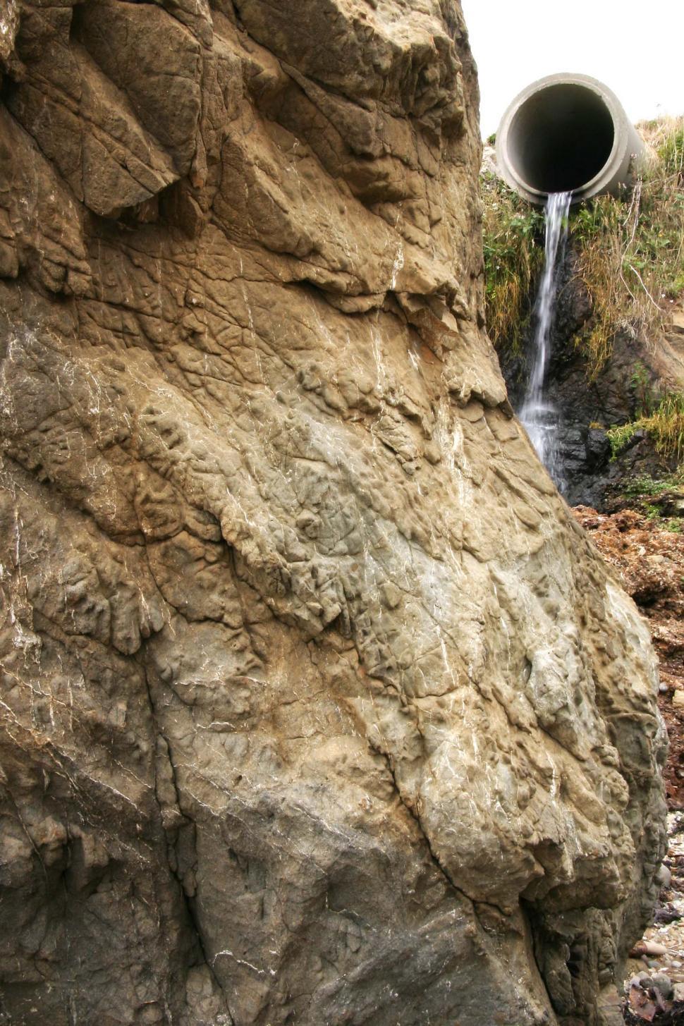 Free Stock Photo of Large Pipe Protruding From Side of Mountain ...