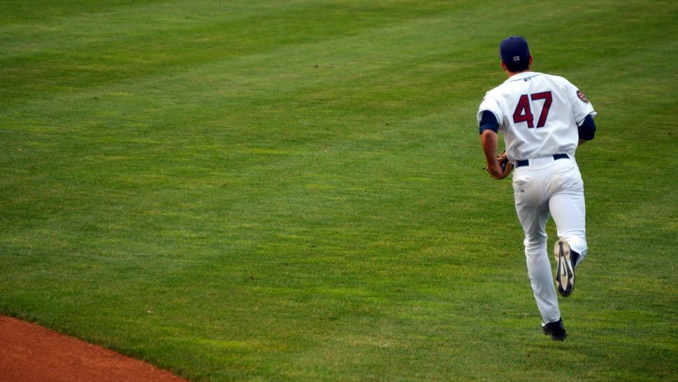 Free Stock Photo of Baseball Player Running Across Baseball Field ...