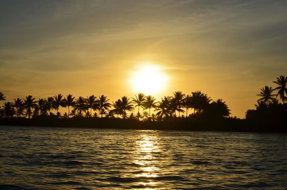 Free Stock Photo of The Sun Sets Over a Tropical Island | Download Free ...