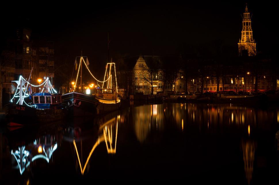 Free Stock Photo of Night Scene of River With Bridge and Buildings ...
