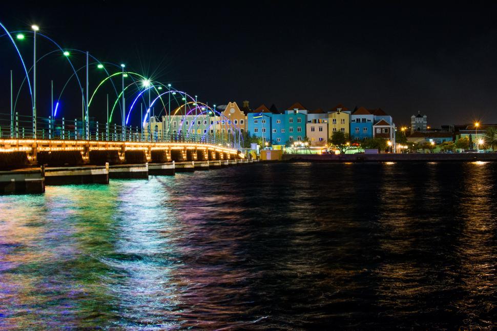 Free Stock Photo of Bridge Illuminated Over Water at Night | Download ...