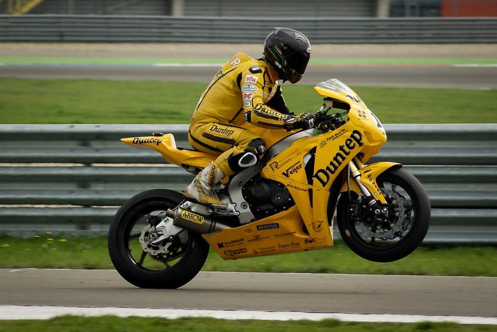Free Stock Photo of Person Riding Yellow Motorcycle on Track | Download ...
