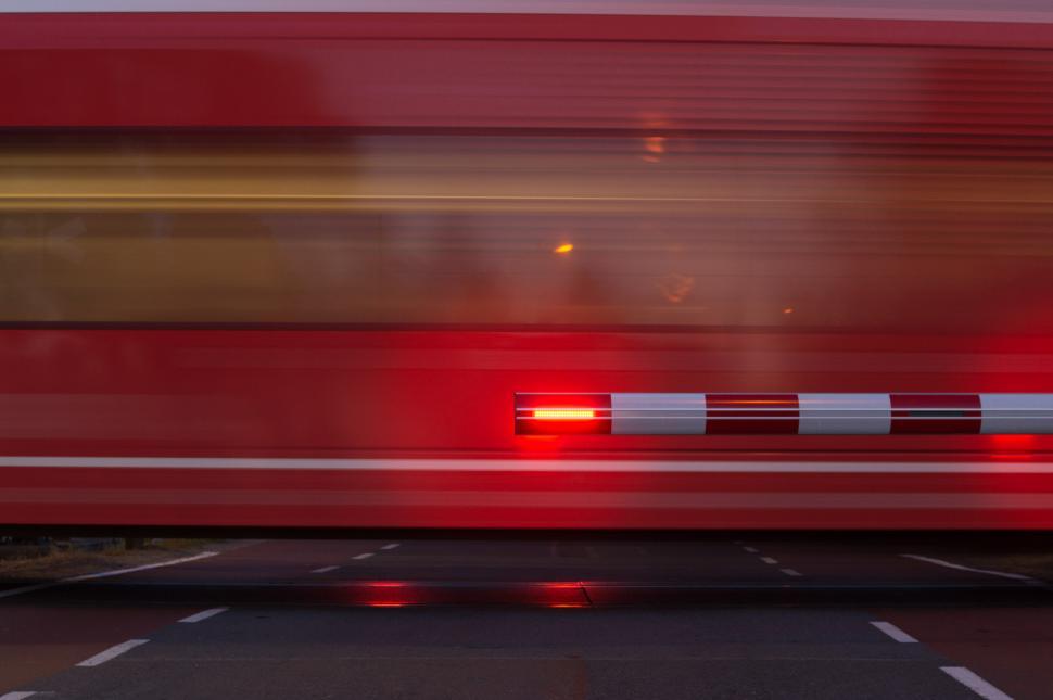 Free Stock Photo of Red Train Passing Traffic Light on Train Tracks ...