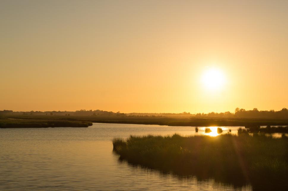 Free Stock Photo of Sun Setting Over Body of Water | Download Free ...