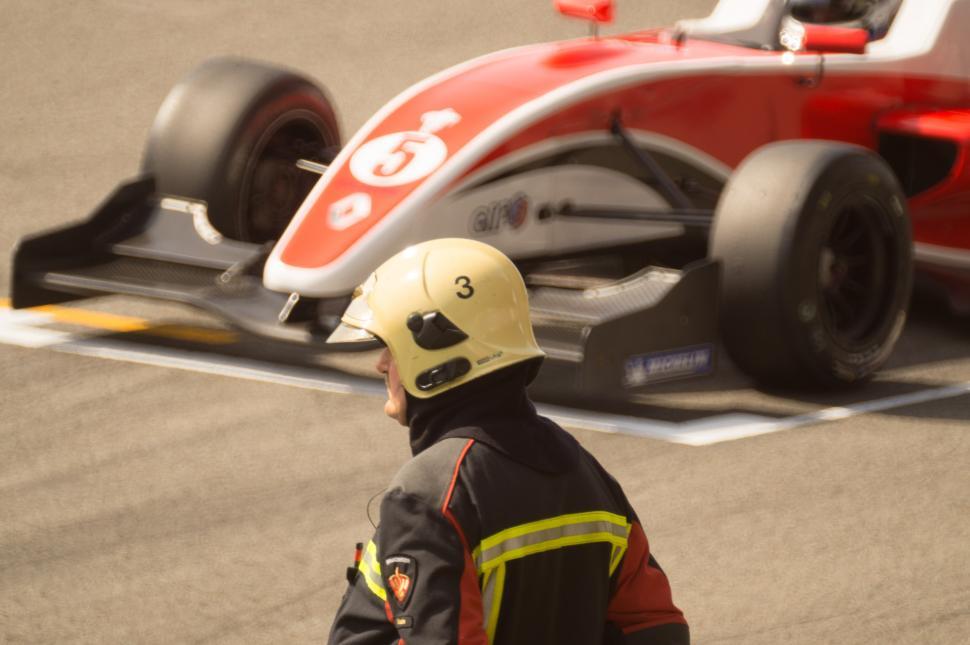 Free Stock Photo of Man in Yellow Helmet Standing in Front of Race Car ...