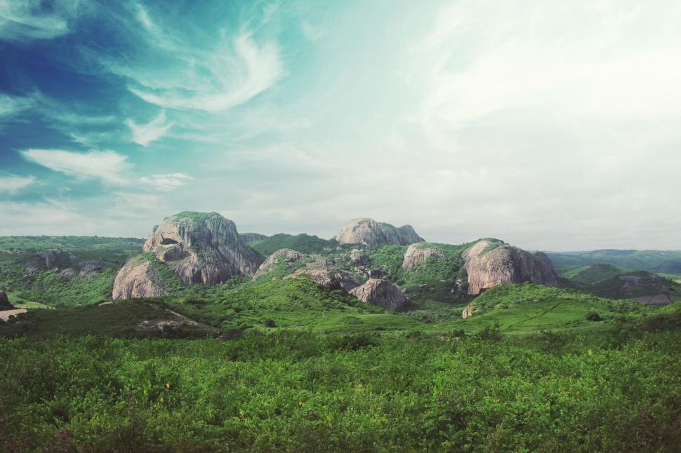 Free Stock Photo of Green Field With Rocks in Background | Download ...