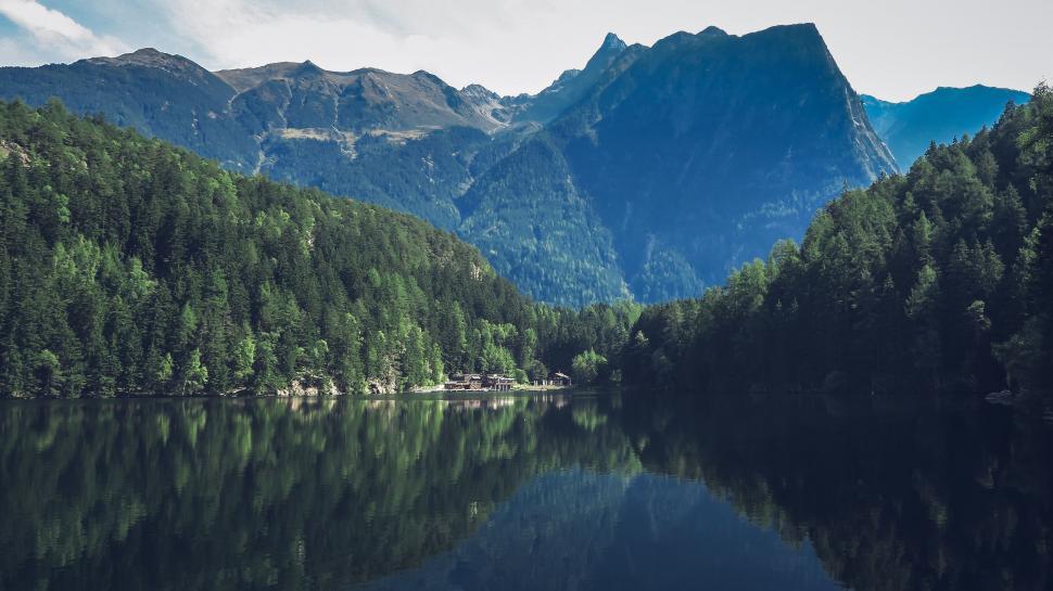 Free Stock Photo of Majestic Lake Surrounded by Towering Mountains ...