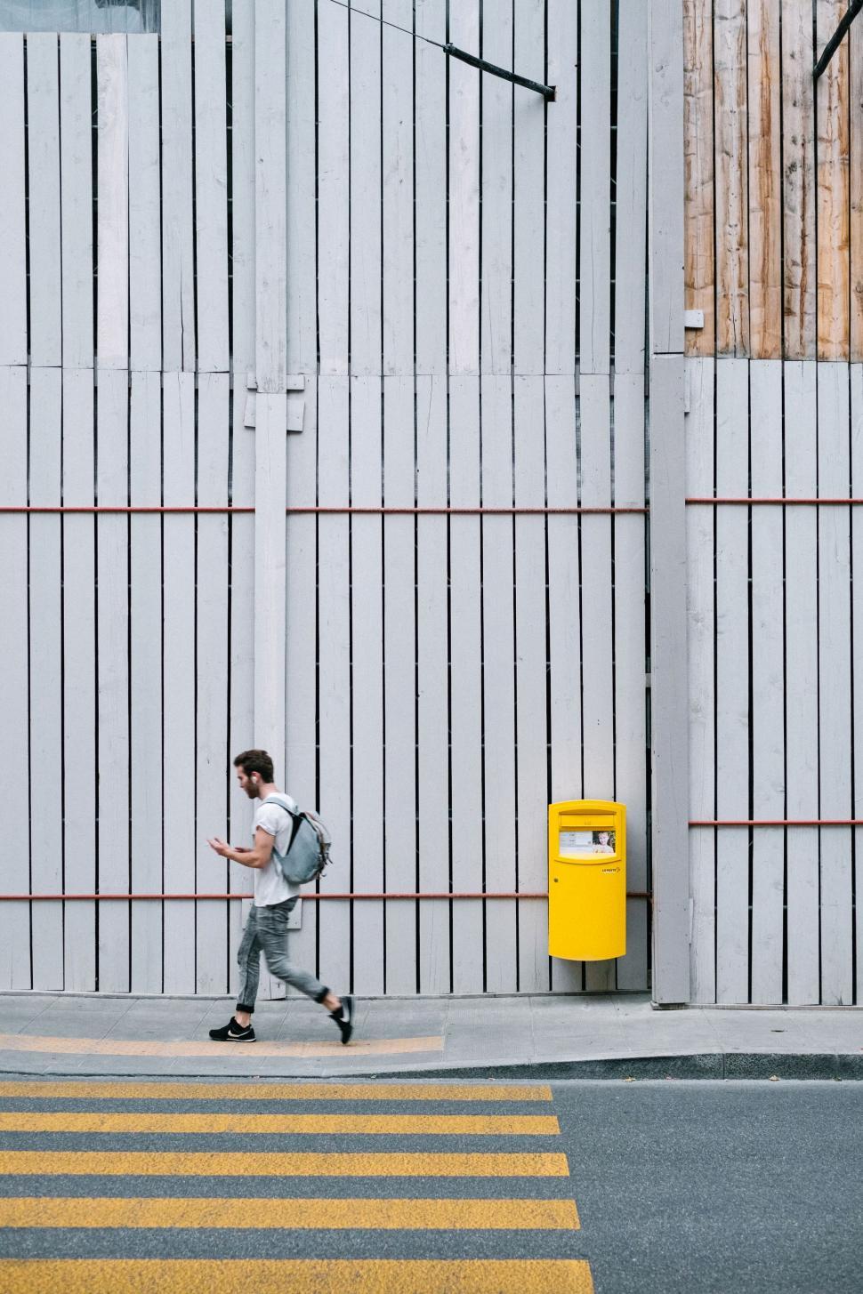 Free Stock Photo of Woman Walking Across Crosswalk in Front of Building ...